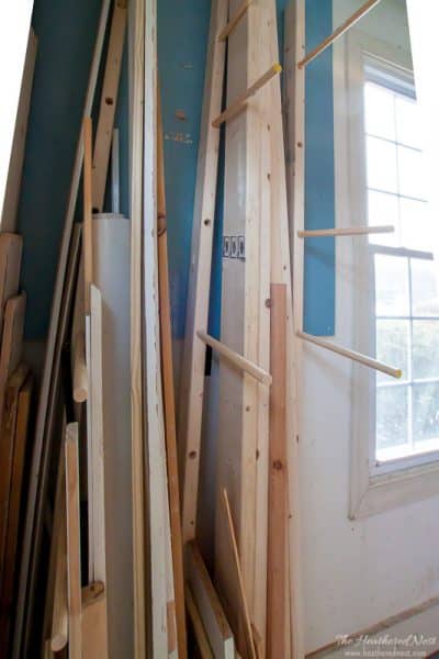 Easy DIY wood rack for storing lumber - The Heathered Nest