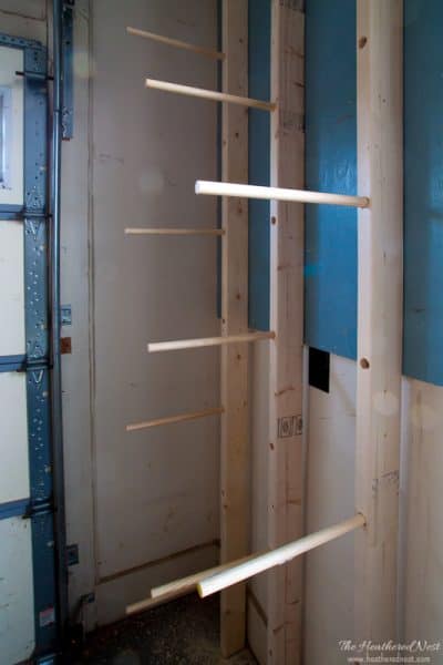 Easy DIY wood rack for storing lumber - The Heathered Nest