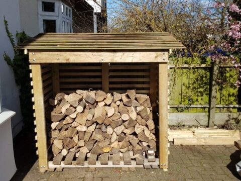 21 BEST Firewood Storage Ideas To DIY or Buy!