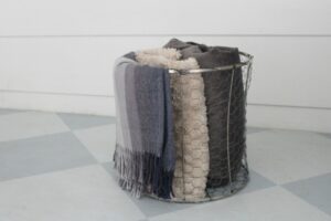 19 Best Blanket Storage Ideas For a Cozy & Tidy Home